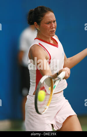 Sybille Bammer of Austria returns the ball to Elena Dementieva of ...