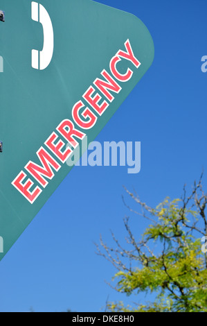 Panic alarm for call to police, emergency button in public park. Blue ...