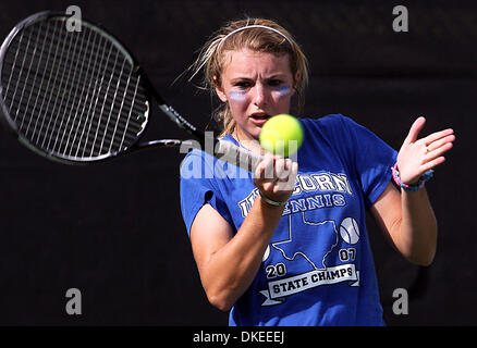 SPORTS Lilly Kimbell returns a volley during her championship match ...