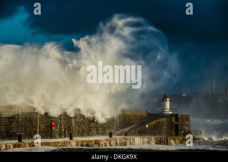 Stormy sea breaks over Banff Harbour in north east Scotland, wave ...