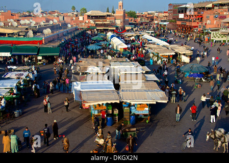 Restaurants, terraces, Kharbouch mosque and minaret, Jemaa-el-Fna ...