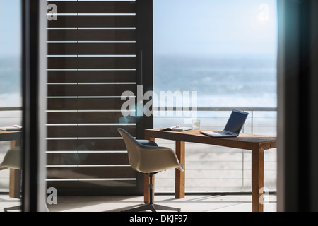 Modern home office with ocean view Stock Photo - Alamy