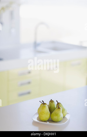 Pears on plate Stock Photo - Alamy