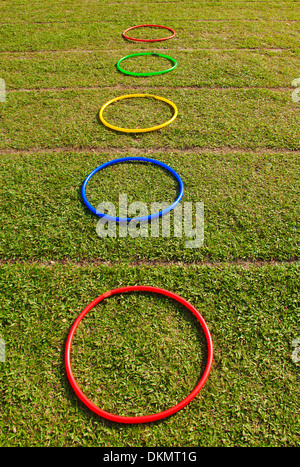 Hula hoops at playground field Stock Photo - Alamy