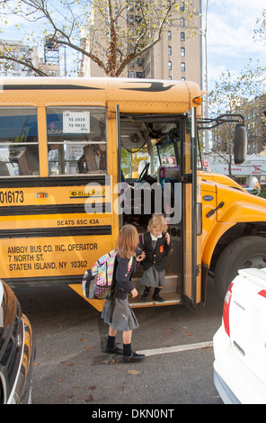 Children getting off school bus Stock Photo - Alamy