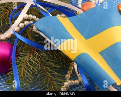 Sweden flag with christmas decoration, new year card Stock Photo - Alamy