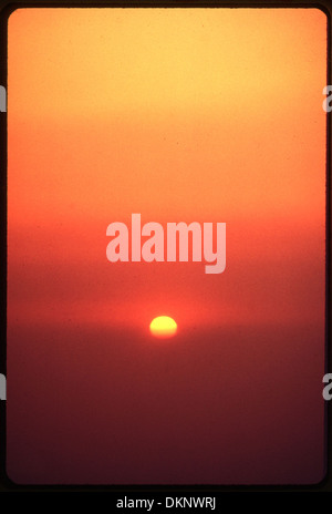 SUNSET SEEN THROUGH SMOG Stock Photo - Alamy