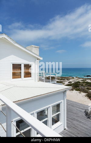 Beach house overlooking ocean Stock Photo - Alamy