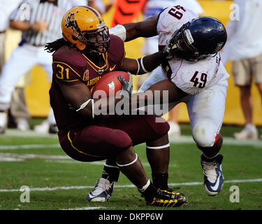 Arizona State's Dimitri Nance (31) is tackled by UCLA linebacker Kyle ...