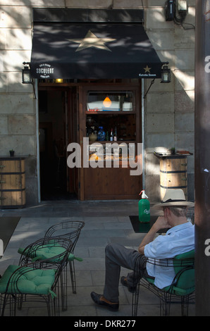 A man wearing a traditional Catalan hat called barretina in the streets ...