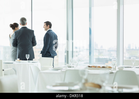 Business people talking in restaurant Stock Photo - Alamy