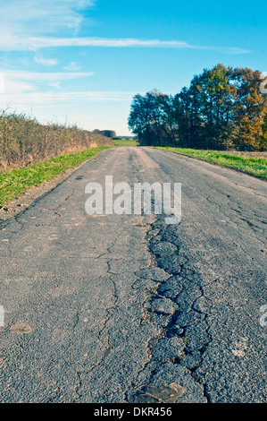 Road damage in road surface Stock Photo - Alamy