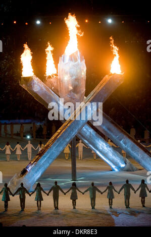 The Olympic cauldron burns at the 2010 Vancouver Winter Olympics Monday ...