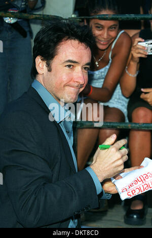 Los Angeles, USA. John Cusack and director- James McTeigue in a scene ...