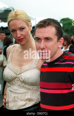 Actor Tim Roth and his wife Nikki Butler arrive at the premiere of ...