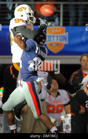 Hubert Anyiam (#84) of the Oklahoma State University Cowboys holds off ...