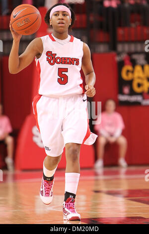 St. John's guard Nadirah McKenith #5 looks to go up while Notre Dame ...