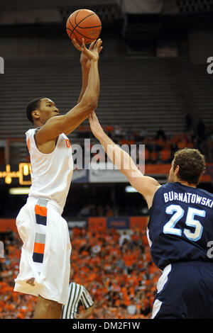 Syracuse forward Wesley Johnson (4) launches into air for the foul line ...