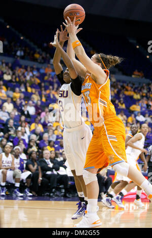 LSU guard Latear Eason (3) battles Louisville forward Candyce Bingham ...