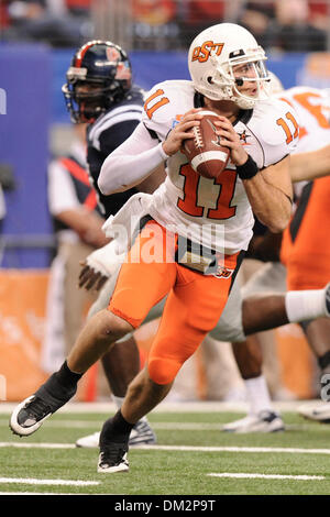 Zac Robinson (#11) of the Oklahoma State University Cowboys looks ...