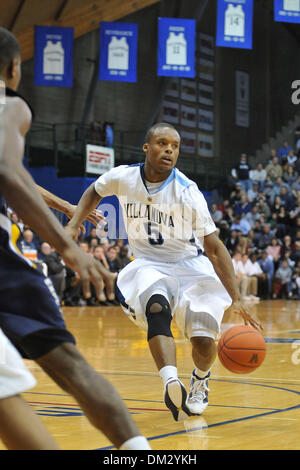Villanova guard Maalik Wayns #5 drives past DePaul guard Jeremiah Kelly ...