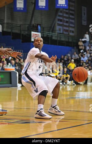 Villanova guard Maalik Wayns #5 drives past DePaul guard Jeremiah Kelly ...