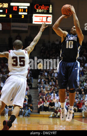 St. Josephs Guard Carl Jones #35 trys to defend Villanova Guard Maalik ...
