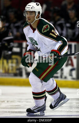 Houston Aeros Center Cody Almond (12) crosses the blue line as the ...