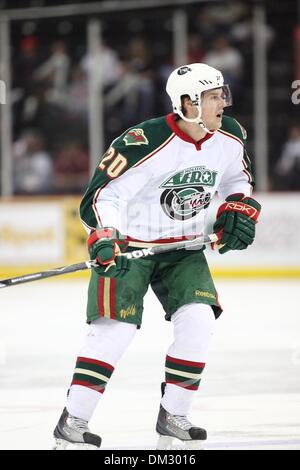 Houston Aeros Center Chad Rau (20) looks for a pass at the red line ...