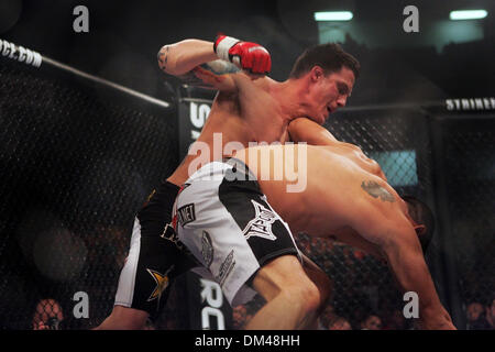 Erik Apple, Newport Beach, CA (red gloves) punches Bobby Voelker ...
