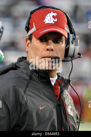 Washington State head coach Paul Wulff talks to Washington quarterback ...