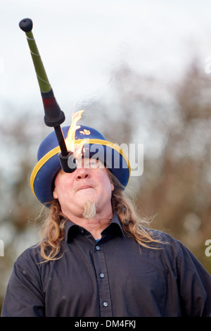 Children's entertainer Jonathan the Jester fire juggling Stock Photo ...