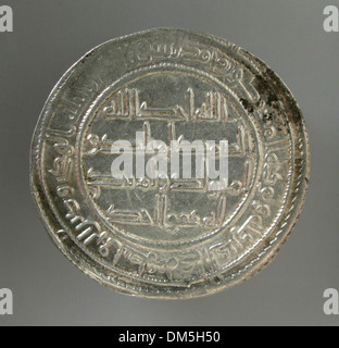 This dirham is an ancient Islamic coin, often used for trade and ...