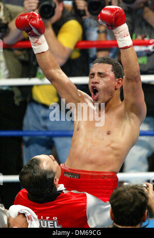 Miguel Cotto, of Puerto Rico, celebrates his victory over Ricardo ...