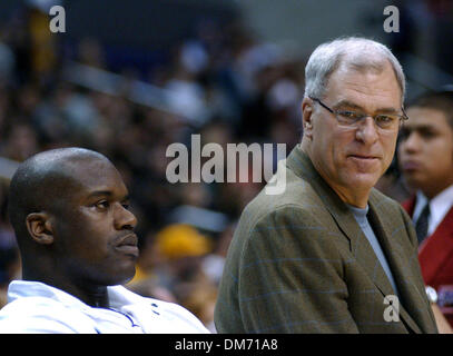 FILE - Los Angeles Lakers' Shaquille O'Neal, right, yells to the crowd ...
