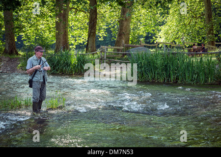 FISHERMAN ON THE AIGRE RIVER NEAR THE PRIORY OF BOUCHE D'AIGRE, 12TH ...