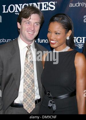 Garcelle Beauvais-Nilon and husband Mike Nilon arriving at the GQ ...