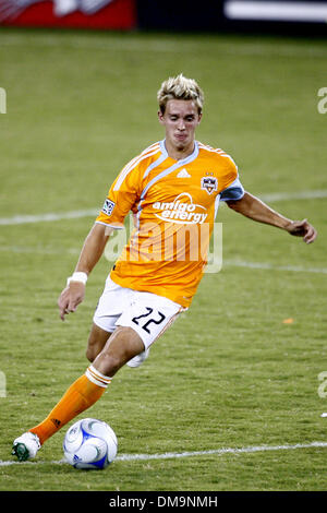 23 August 2009: Houston Dynamo Midfielder Corey Ashe (#26) heads the ...