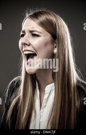 Happy screaming blonde business woman holding money and looking on ...