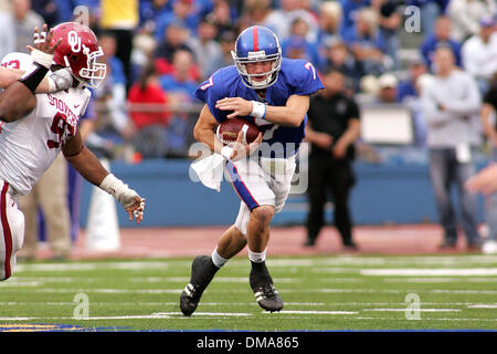 Kansas quarterback Kale Pick (7) runs past Oklahoma defensive tackle ...