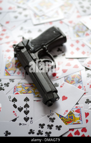 gun and playing cards Stock Photo - Alamy