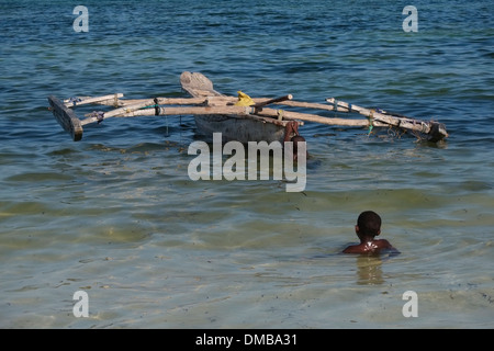 Ngalawa or Ungalawa traditional, double-outrigger canoes used as a ...