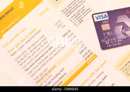 Winter fuel payment, UK fuel bill for gas and electricity with cash and ...