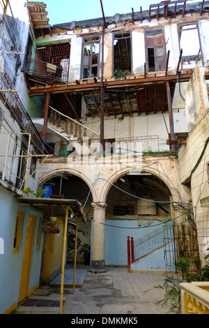 Inhabited run down buildings in Havana, Cuba Stock Photo - Alamy