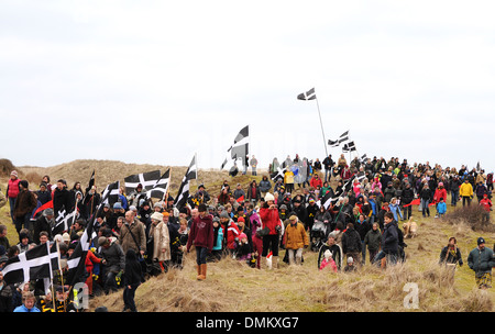Cornish people marching through the dunes at Perranporth,Cornwall,UK ...