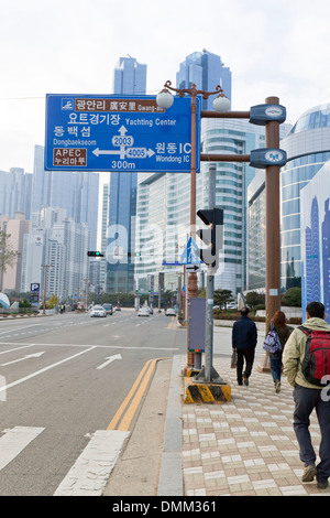 Blue directional traffic sign - Busan, South Korea Stock Photo - Alamy