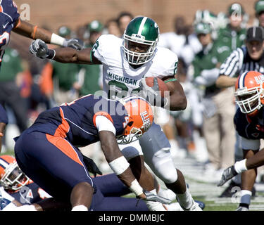 Michigan State running back Larry Caper #22 and Texas Tech linebacker ...