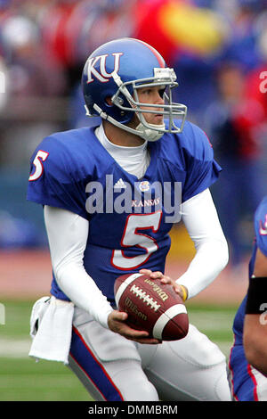 Kansas quarterback Todd Reesing (5) takes the snap during game action ...