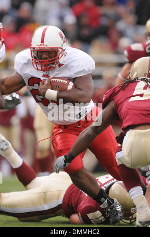 North Carolina State running back Hollywood Smothers (3) is tripped by ...