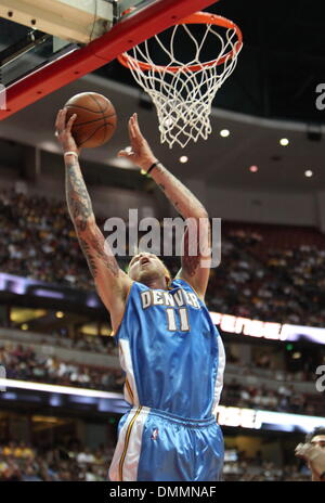Denver Nuggets center Chris Andersen blocks the shot of Los Angeles ...